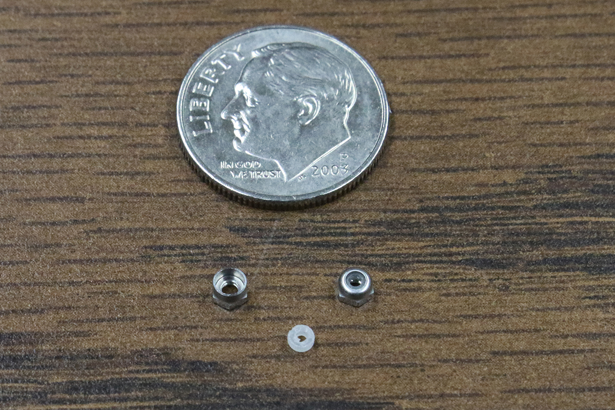 Tiny aerospace part combines stainless steel and laser-cut nylon ...